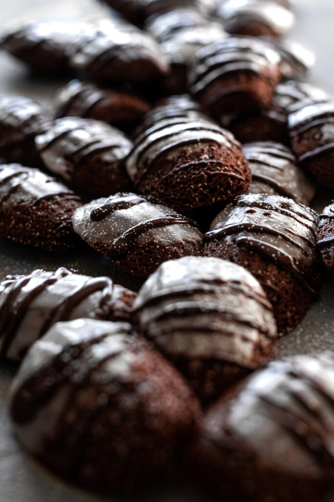 Hot Chocolate Madeleine Cookies with Marshmallow Frosting • A Simple Pantry