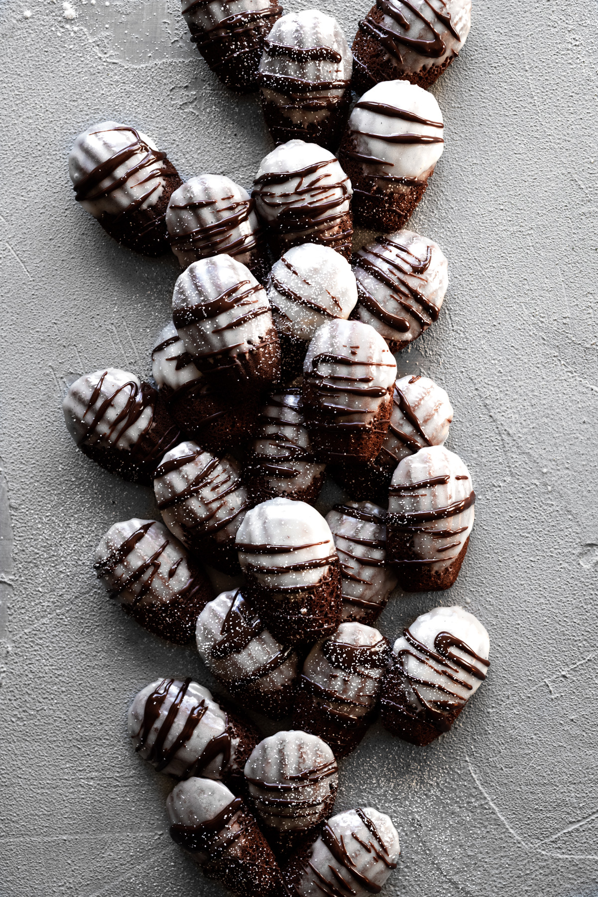 Hot Chocolate Madeleine Cookies with Marshmallow Frosting • A Simple Pantry